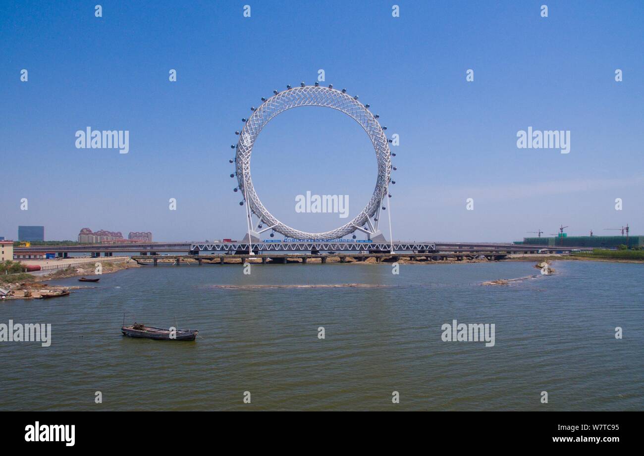 Aerial view of Bailang River Bridge Ferris Wheel, the world's first ...