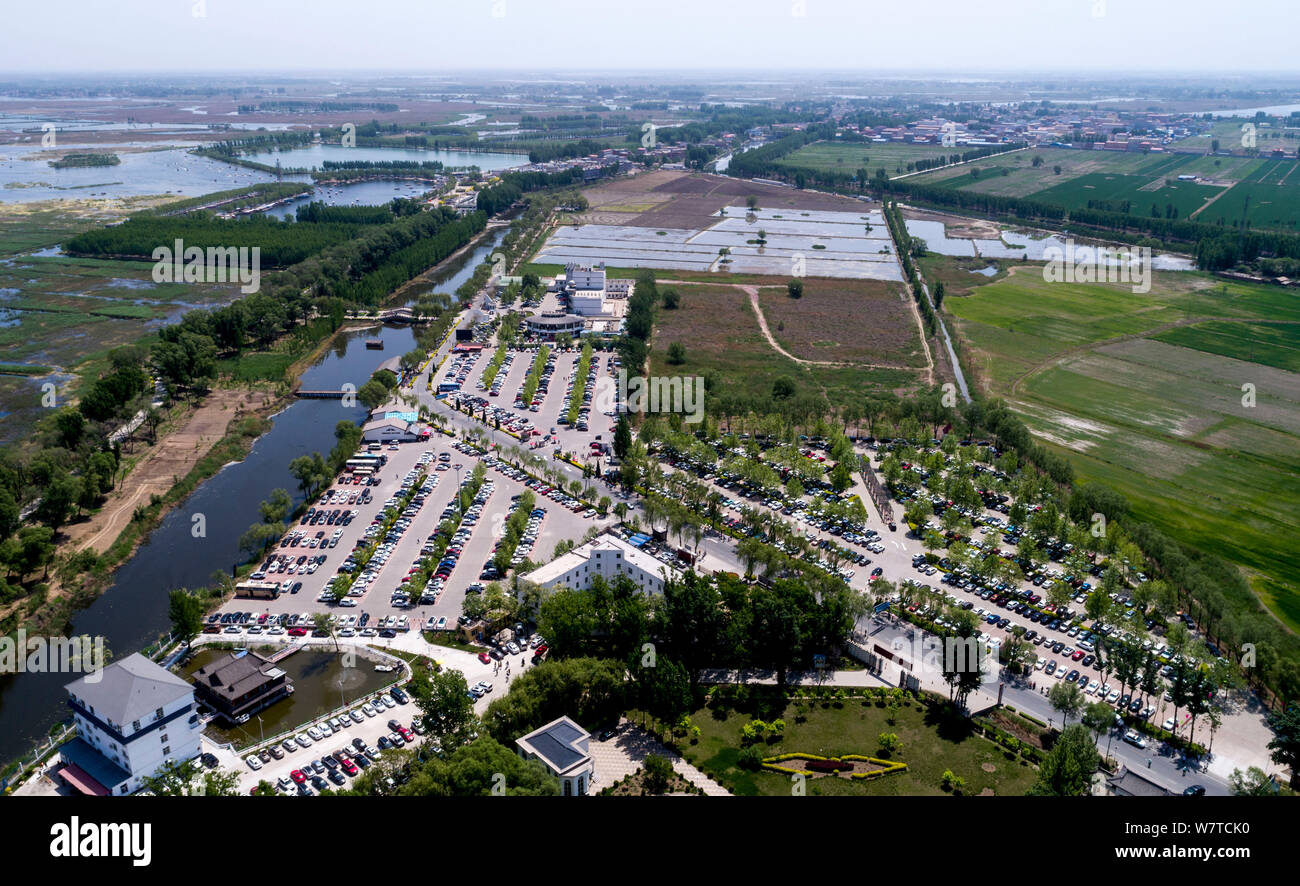 Aerial view of vehicles in the parking lot of the Baiyangdian Lake ...