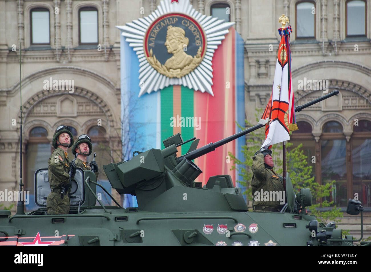 Russian soldiers in a T-14 Armata battle tank march along the Red ...