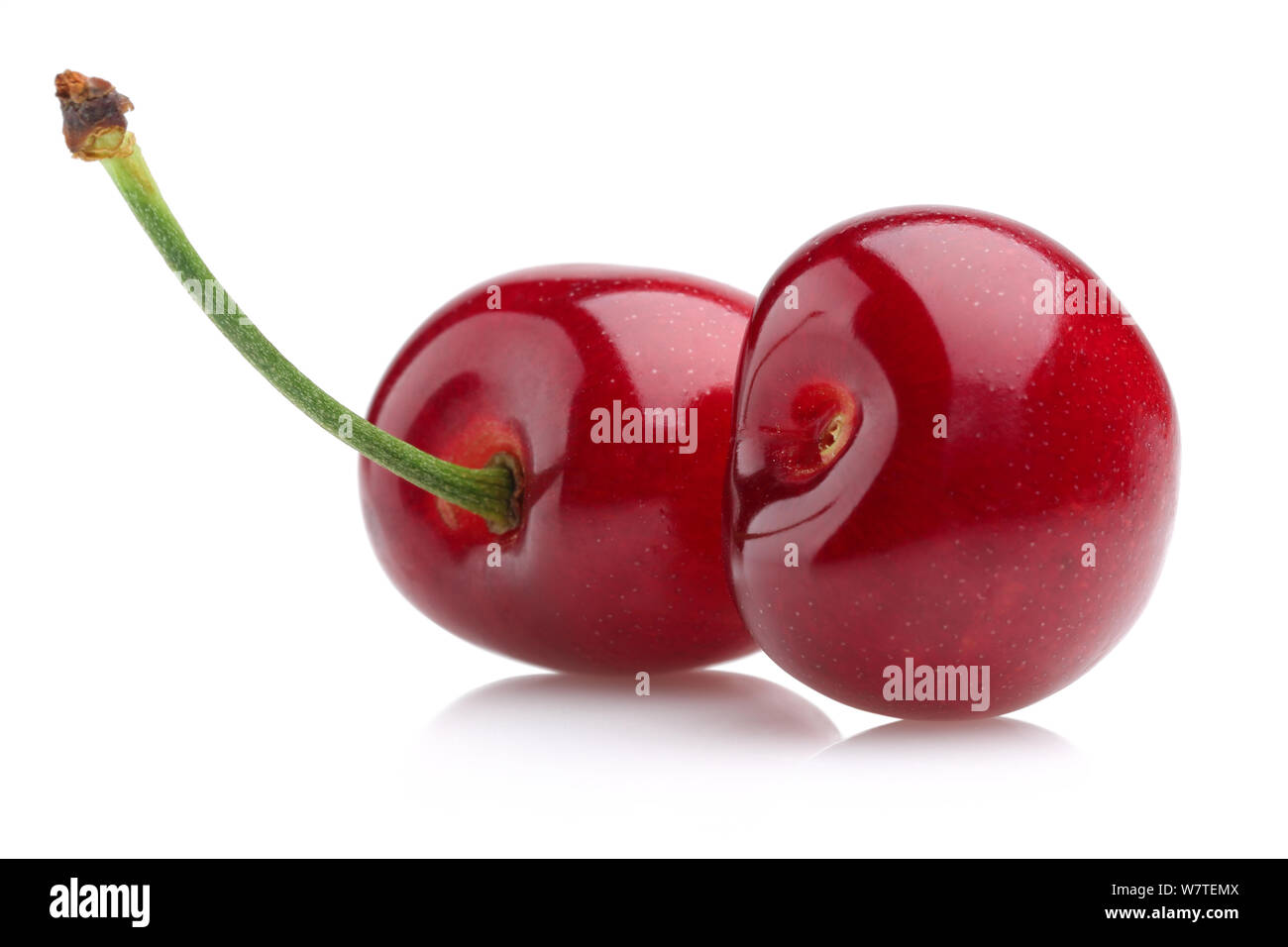 Fresh red cherries isolated on white background Stock Photo - Alamy