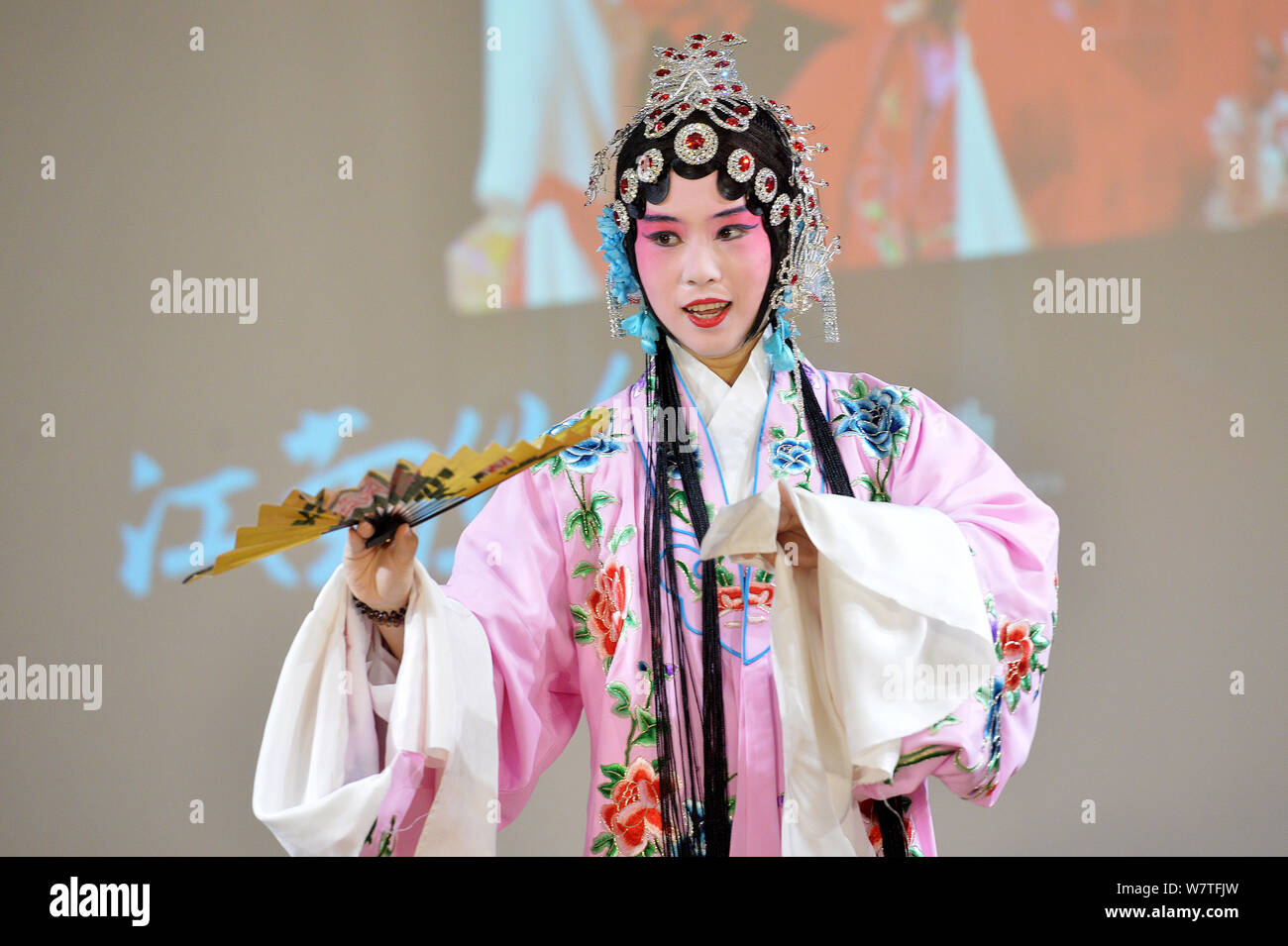 A traditional Chinese opera actress performs at Jiangnan Silk Museum in ...