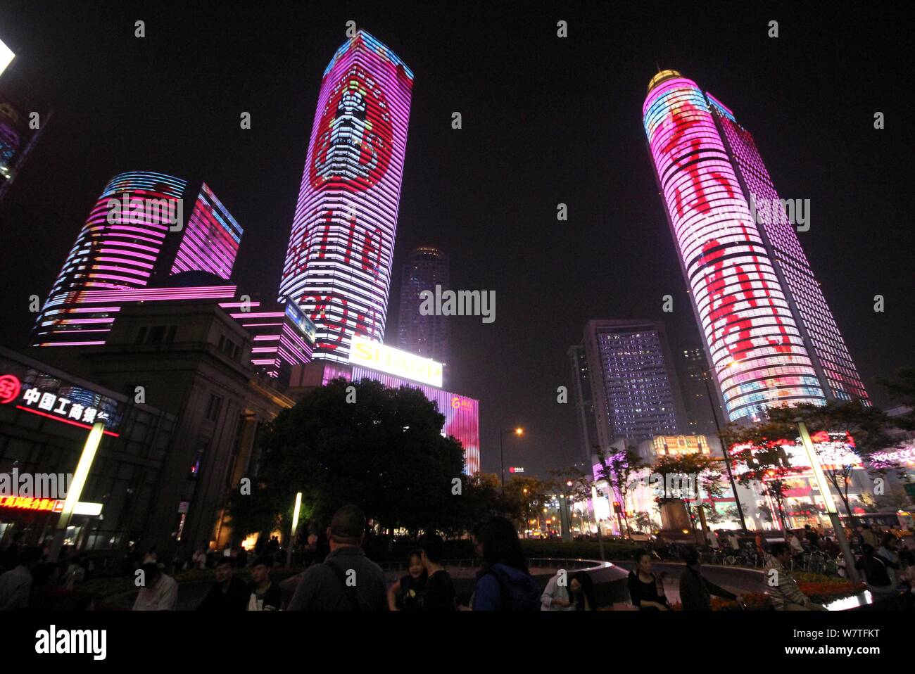 High-rise buildings are illuminated with lights to welcome the upcoming ...