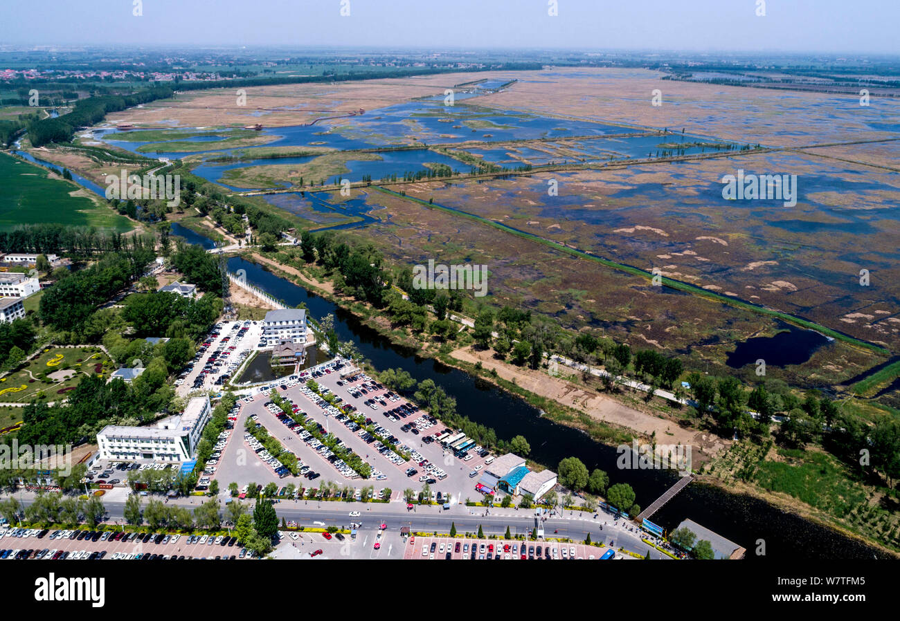 Aerial view of vehicles in the parking lot of the Baiyangdian Lake ...