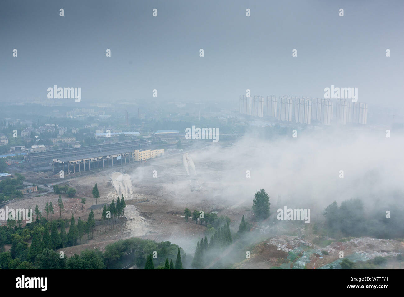 A view of debris of two 180-meter-tall chimneys and a cooling tower ...
