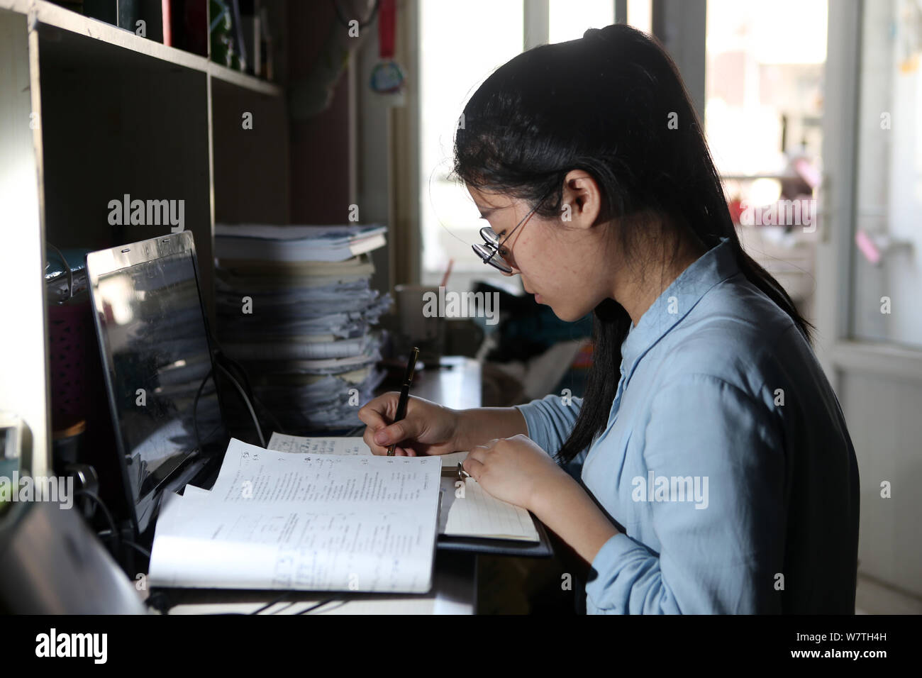 21-year-old Chinese student Tang Lisha, who comes from a poor family in ...