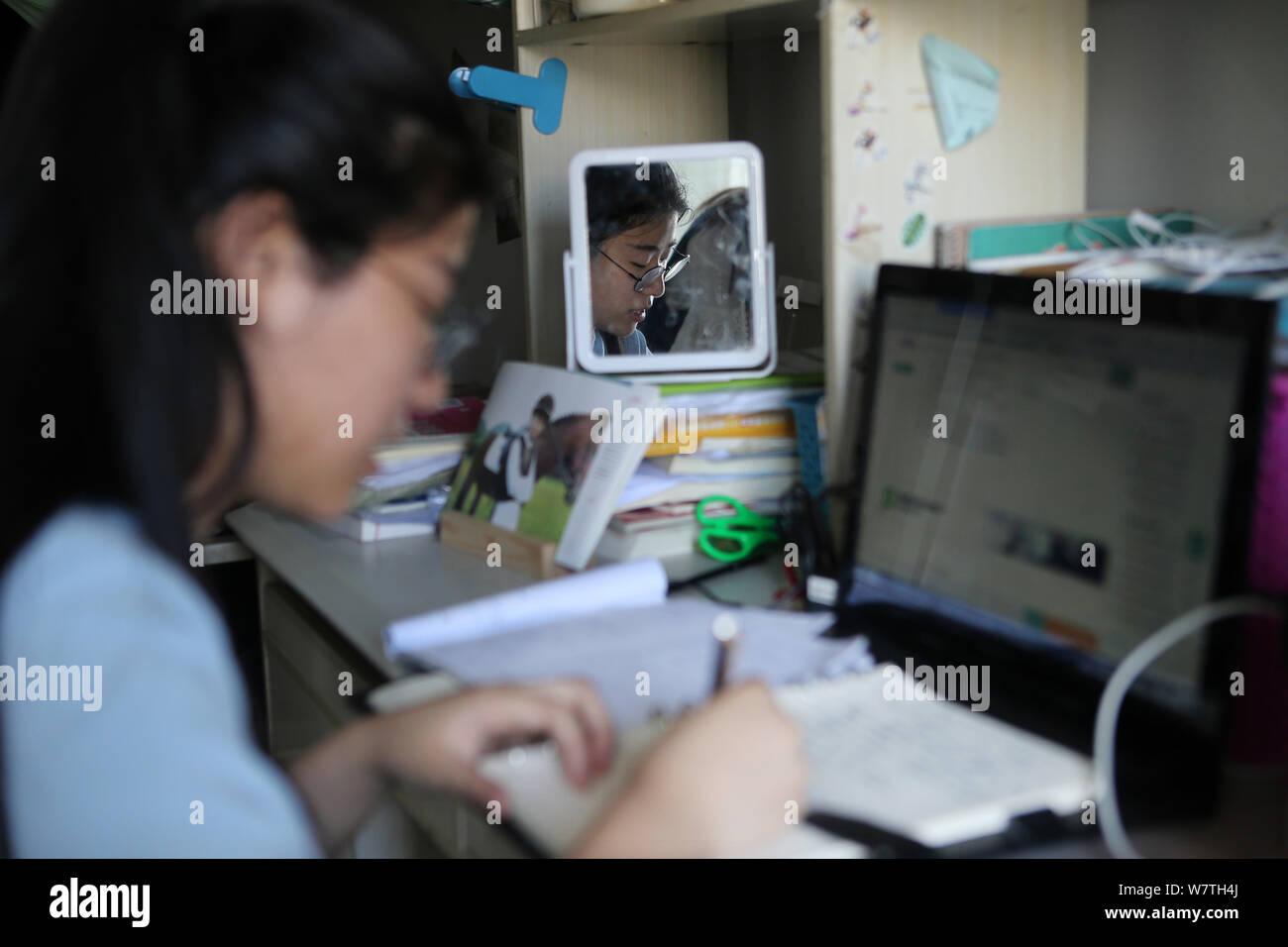 21-year-old Chinese student Tang Lisha, who comes from a poor family in ...