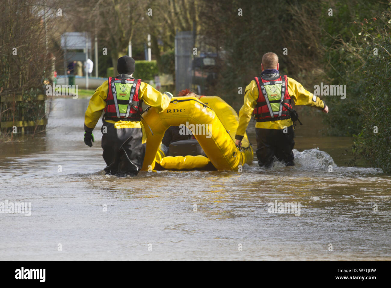 Rescue flood volunteers from Mercia Rescue Service with inflatable raft ...