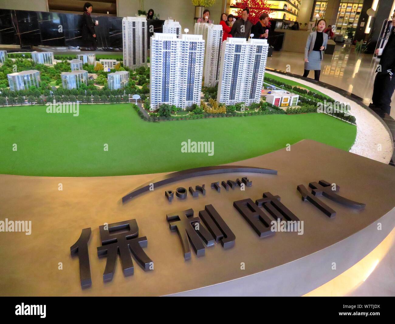 --FILE--View of a signboard of Poly Time, a real estate project of Poly ...