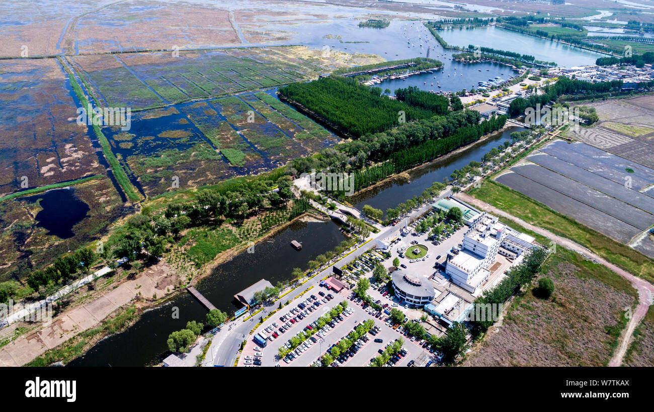 Aerial view of vehicles in the parking lot of the Baiyangdian Lake ...