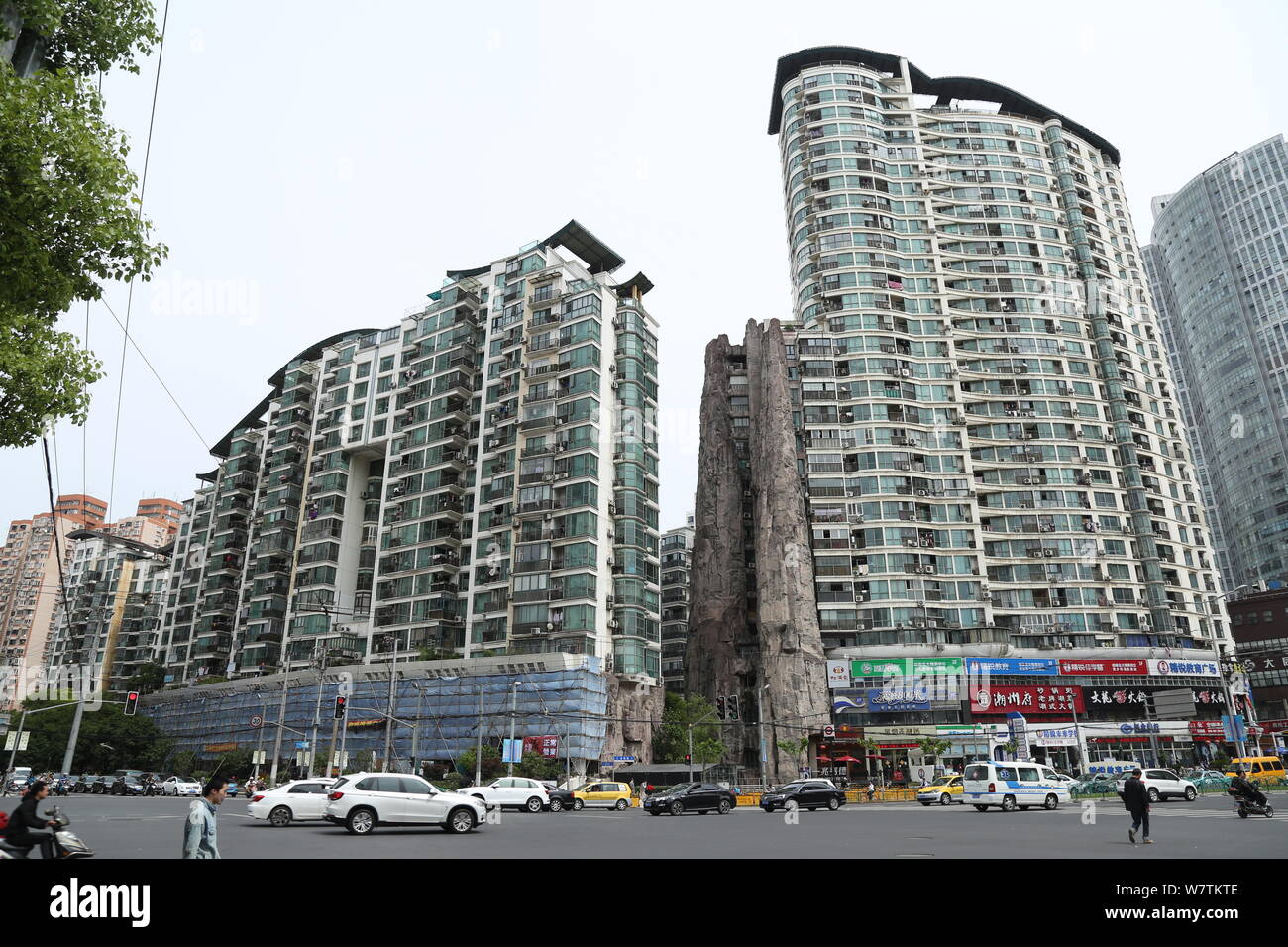 View of a residential building decorated by rockery reaching above 14 ...
