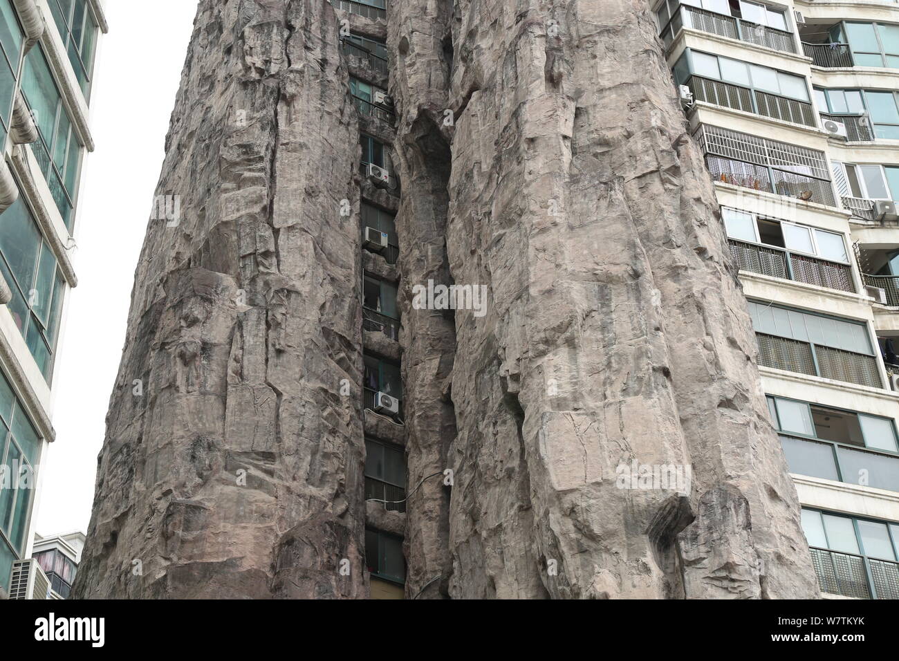 View of a residential building decorated by rockery reaching above 14 ...