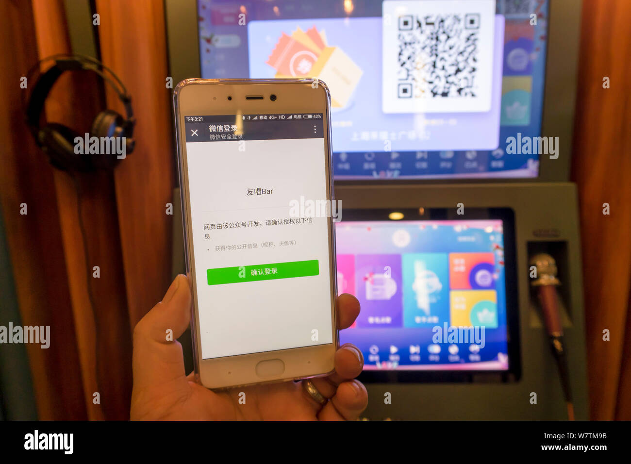 A Chinese mobile phone user scans a QR code via mobile payment service ...