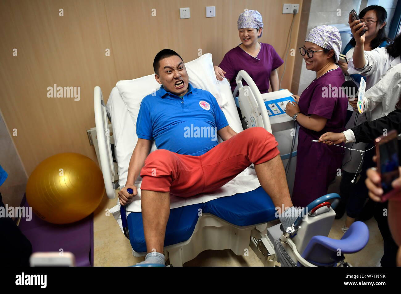 Pregnant man hospital pain hi-res stock photography and images - Alamy
