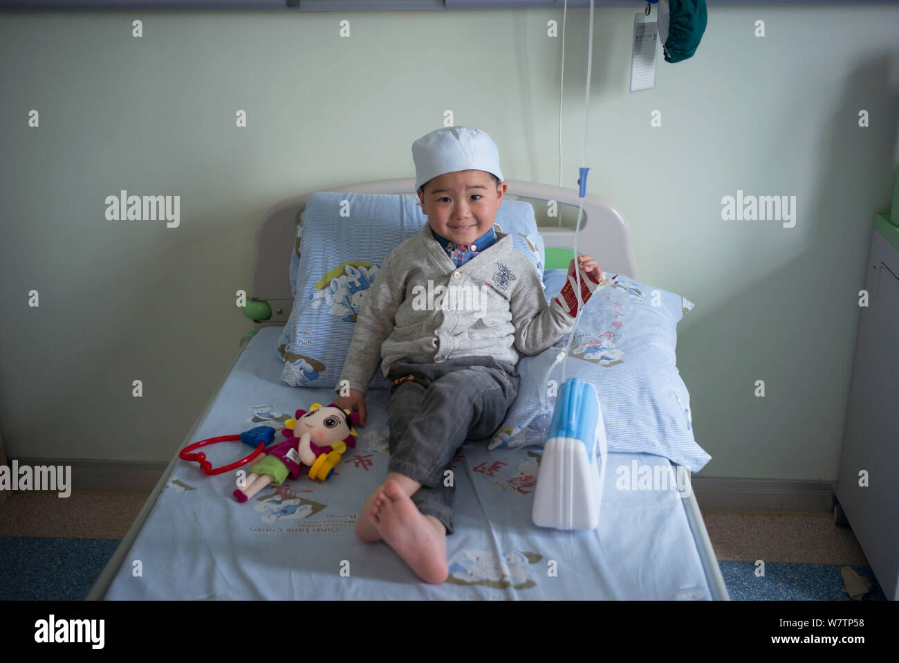 Three-year-old Chinese boy Chen Chen is pictured as he receives ...