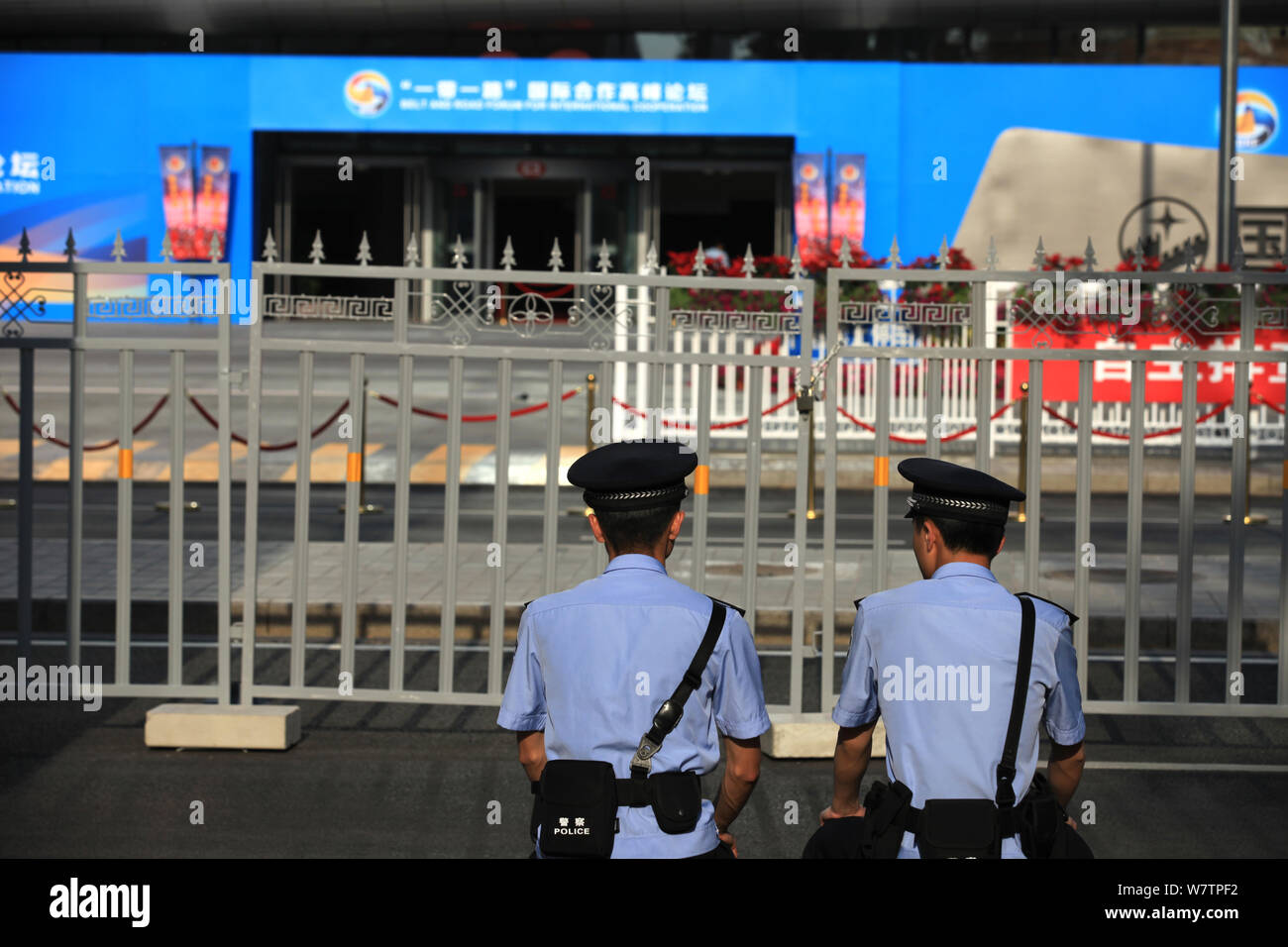 Chinese police officers patrol the China National Convention Center ...