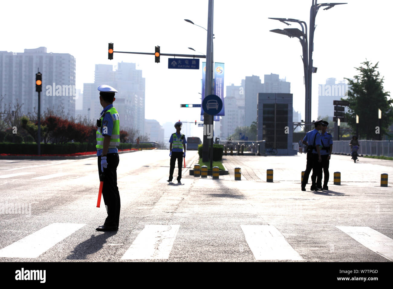 Chinese police officers patrol the China National Convention Center ...
