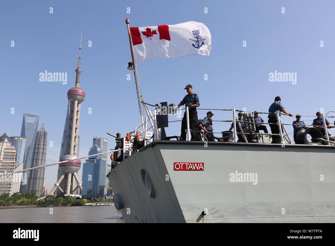 Navy soldiers stand on the deck of Canadian naval ship HMCS Ottawa at a ...