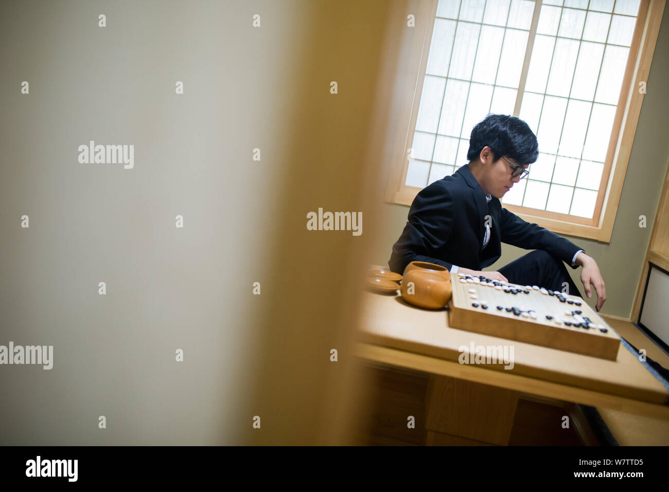 --FILE--Chinese Go player Ke Jie poses during an interview in Beijing ...