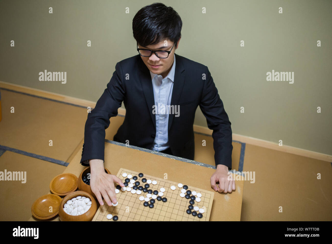 --FILE--Chinese Go player Ke Jie poses during an interview in Beijing ...
