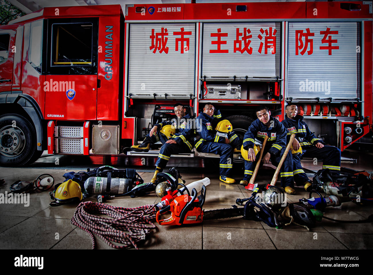 Chinese firefighters of a fire brigade pose for a poster in Liuzhou ...