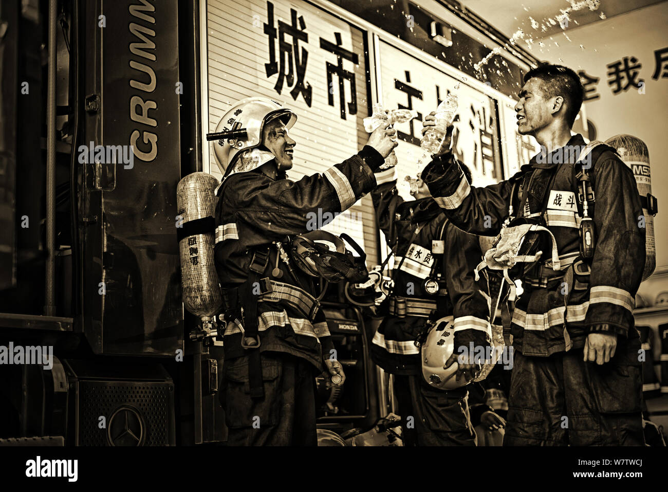 Chinese firefighters of a fire brigade pose for a poster in Liuzhou ...