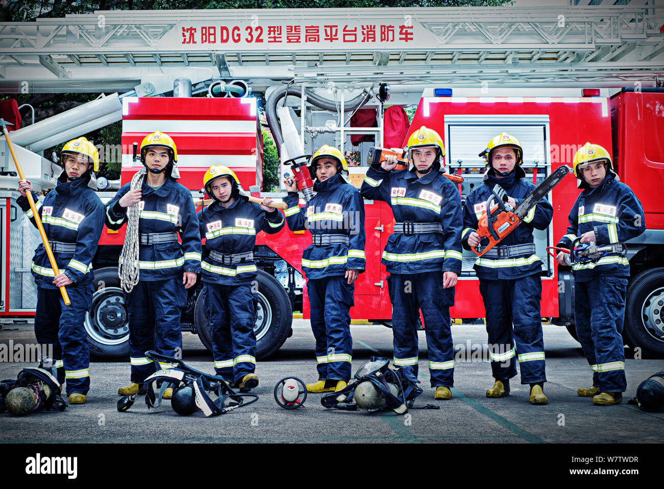 Chinese firefighters of a fire brigade pose for a poster in Liuzhou ...