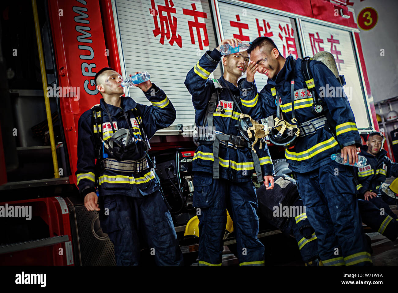 Chinese firefighters of a fire brigade pose for a poster in Liuzhou ...