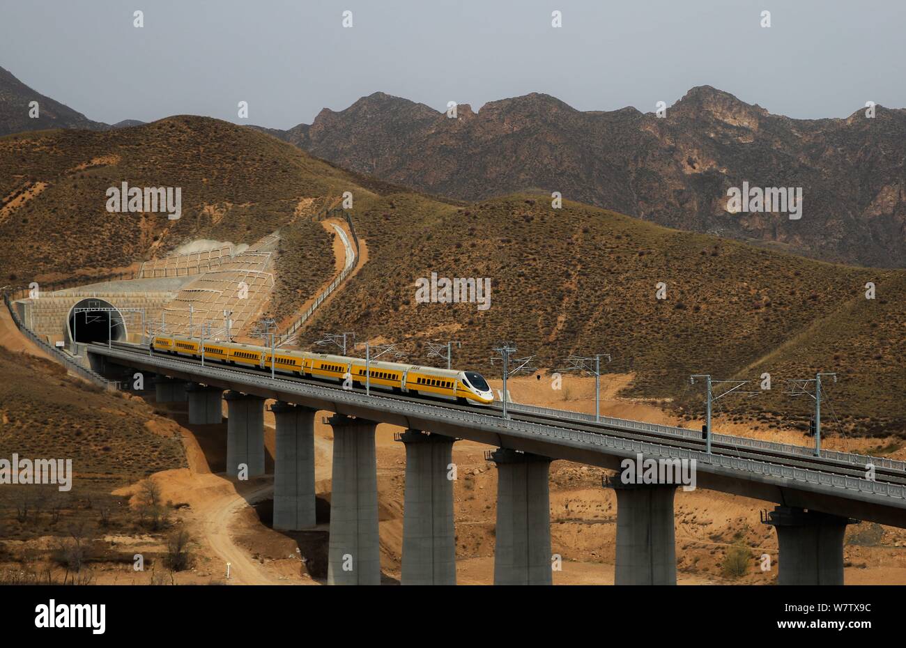 A CRH (China Railway High-speed) bullet train runs for a test on the ...