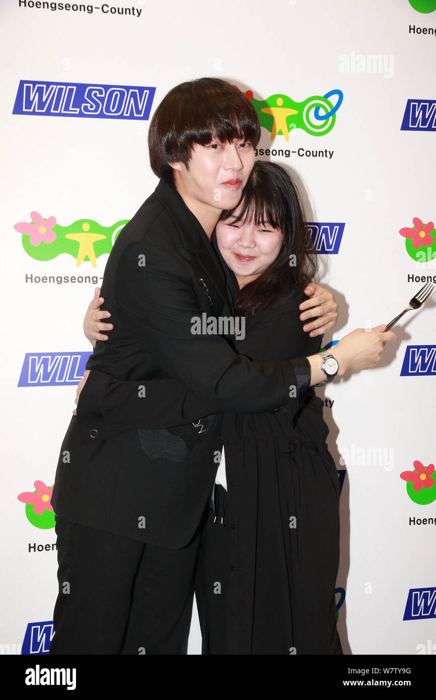 Singer and actor Kim Hee-chul, left, better known by the mononym ...