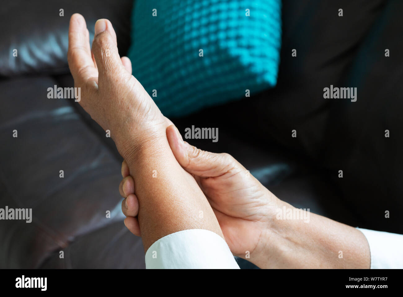 old woman suffering from wrist hand pain, health problem concept Stock ...
