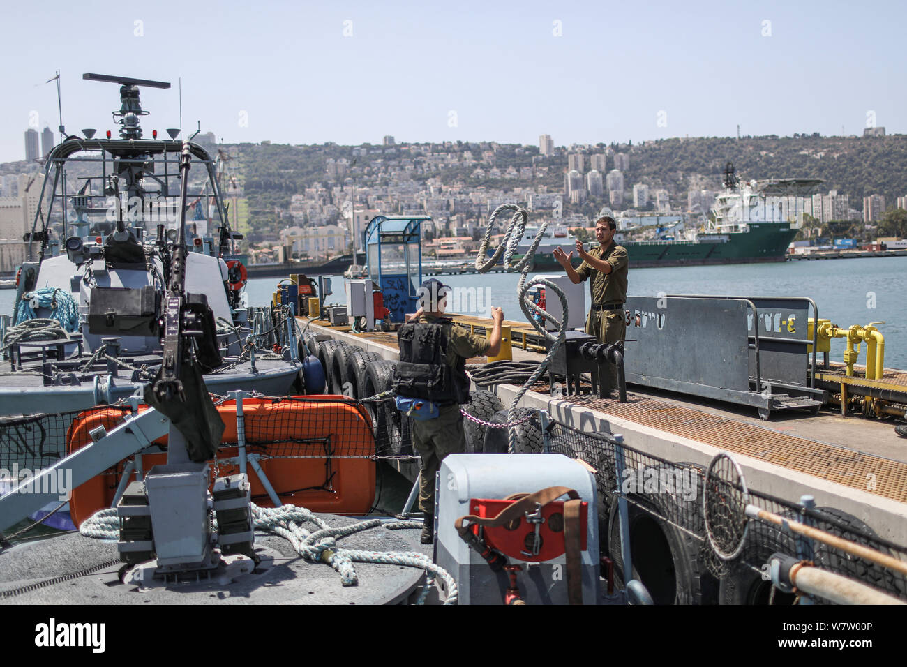 Haifa, Israel. 07th Aug, 2019. Soldiers work on the surface of a ...