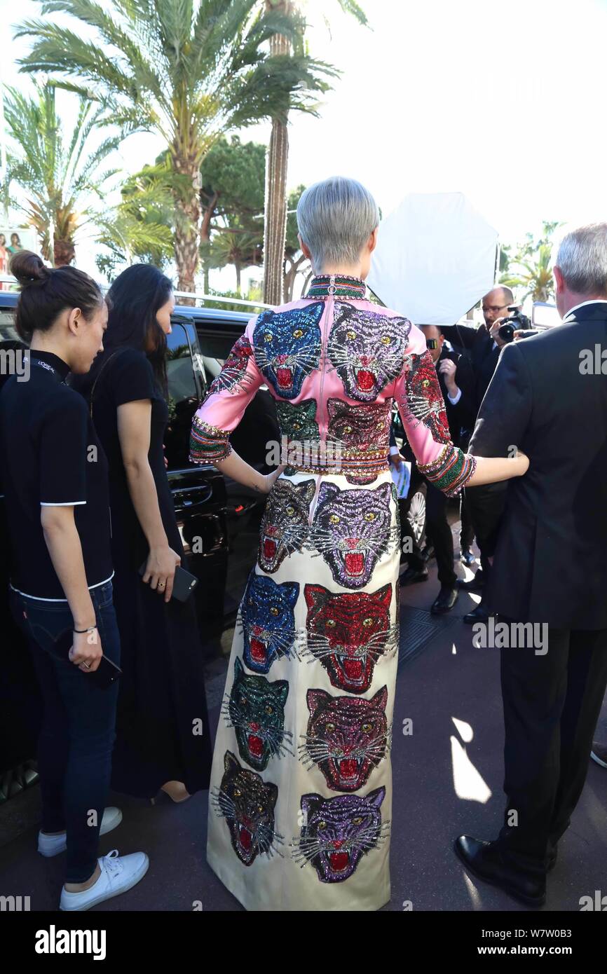 Chinese singer Li Yuchun dressed in a Gucci roaring tiger cheongsam ...