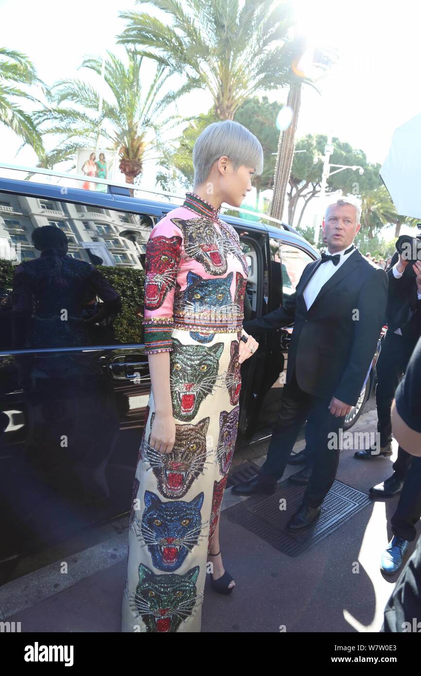Chinese singer Li Yuchun dressed in a Gucci roaring tiger cheongsam ...