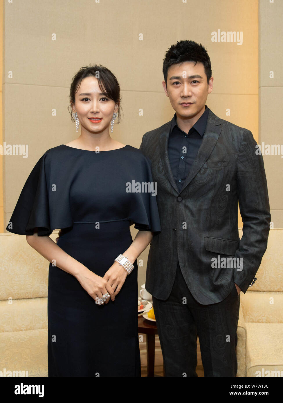 Chinese actress Hu Jing, left, and actor Lu Yi arrive at the award ...