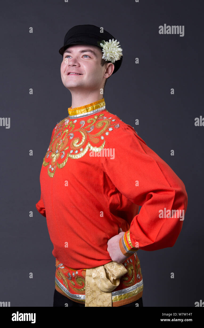 attractive caucasian guy wearing a folk costume, studio picture Stock ...
