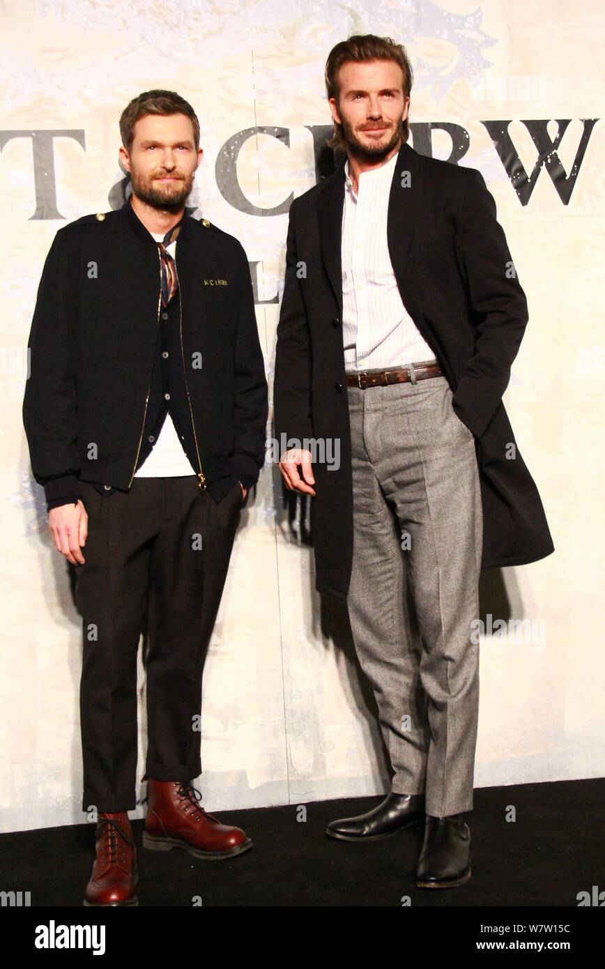 English soccer star David Beckham, right, attends a promotional event ...