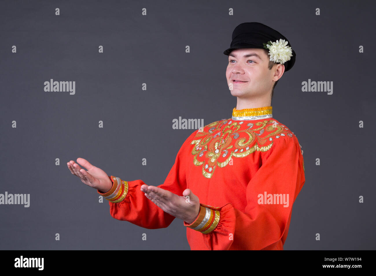 attractive russian guy dancing in folk costume, studio picture Stock ...