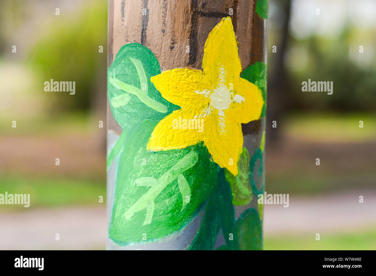 A vivid drawing is painted on a light pole around the campus of ... A vivid drawing is painted on a light pole around the campus of ...