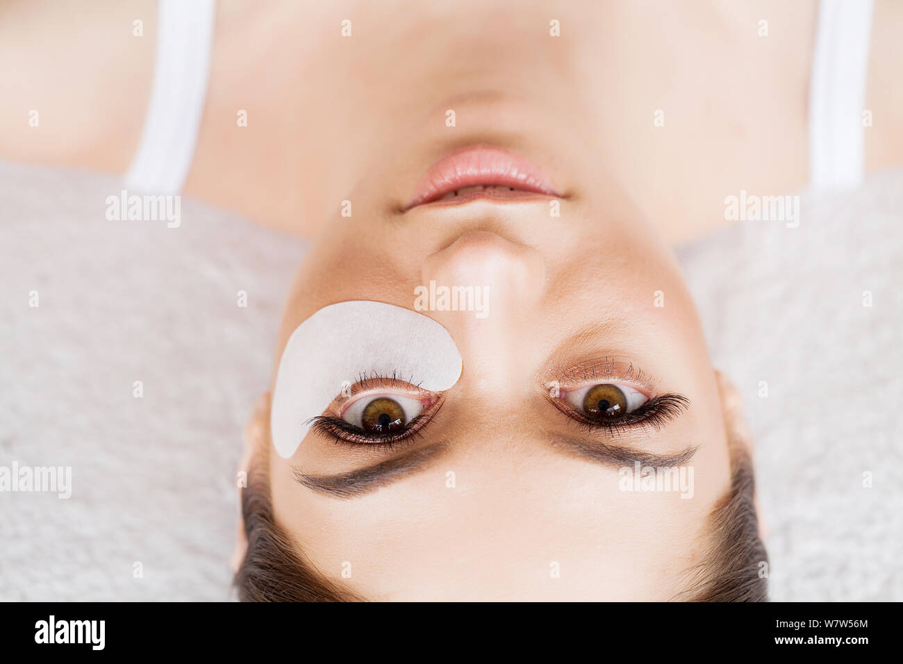 Woman Eye with Long Eyelashes. Beautiful Young Woman During Eyelash ...
