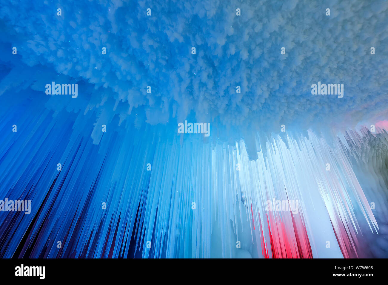 View of the China's largest ice cave with colorful lights in Luya ...