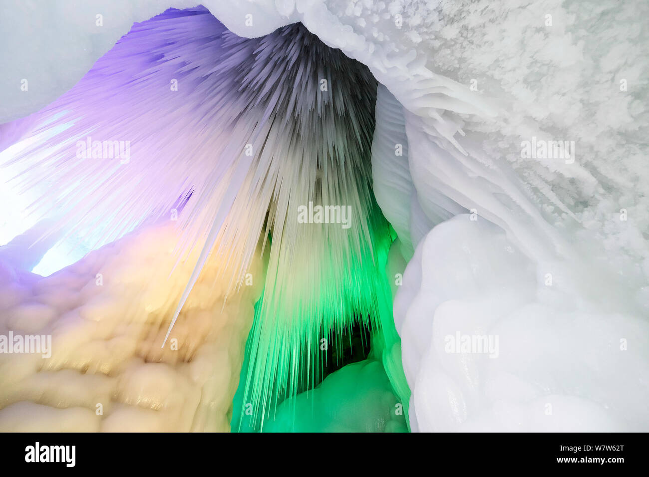 View of the China's largest ice cave with colorful lights in Luya ...