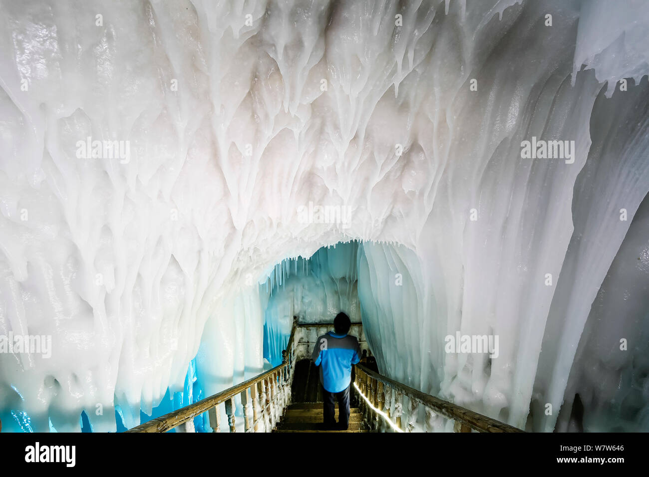 View of the China's largest ice cave with colorful lights in Luya ...