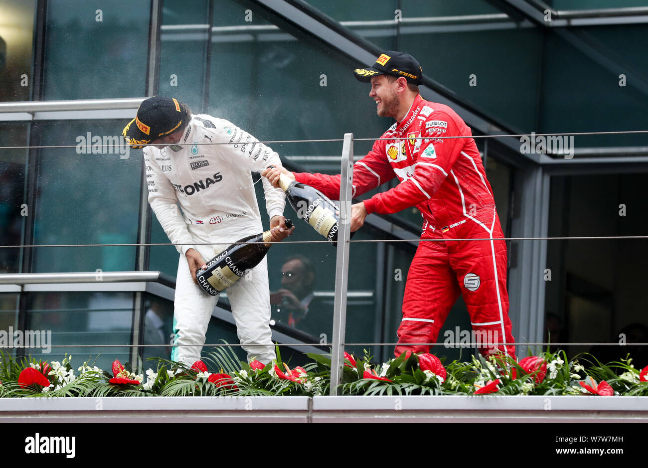 British F1 driver Lewis Hamilton of Mercedes, left, and German F1 ...