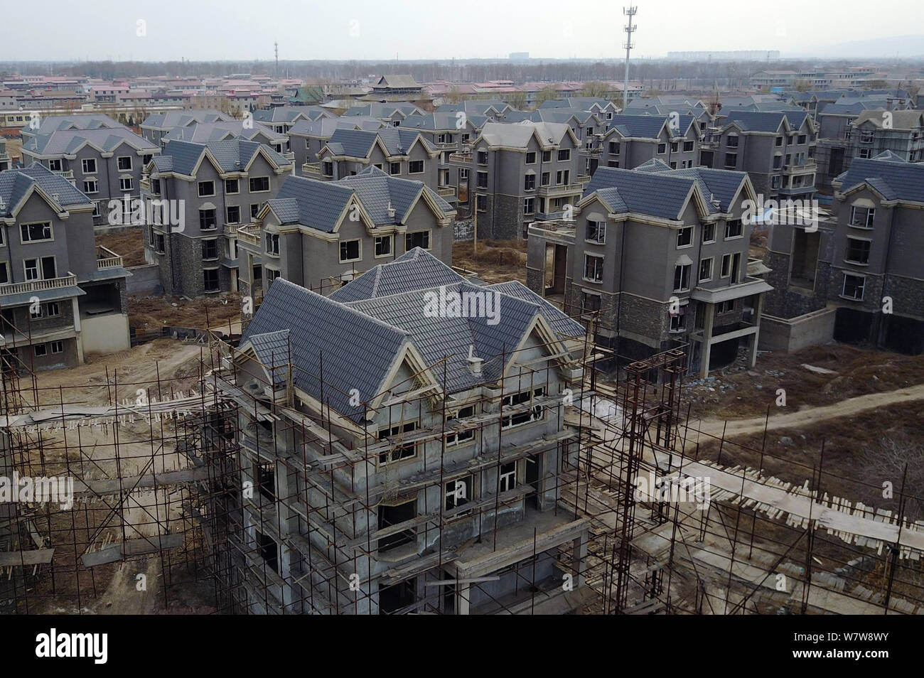 --FILE--Aerial view of unfinished villas for more than nine years at ...