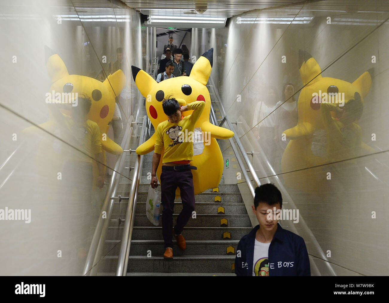 Chinese father Liu Yuehu, who is dressed up as Pikachu to raise money ...