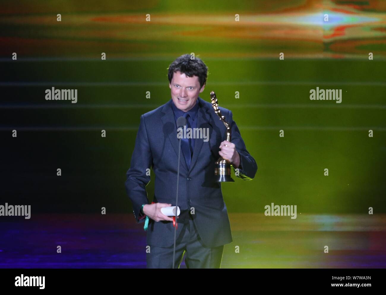 Director Cris Jones poses with his trophy after winning the Best Visual ...