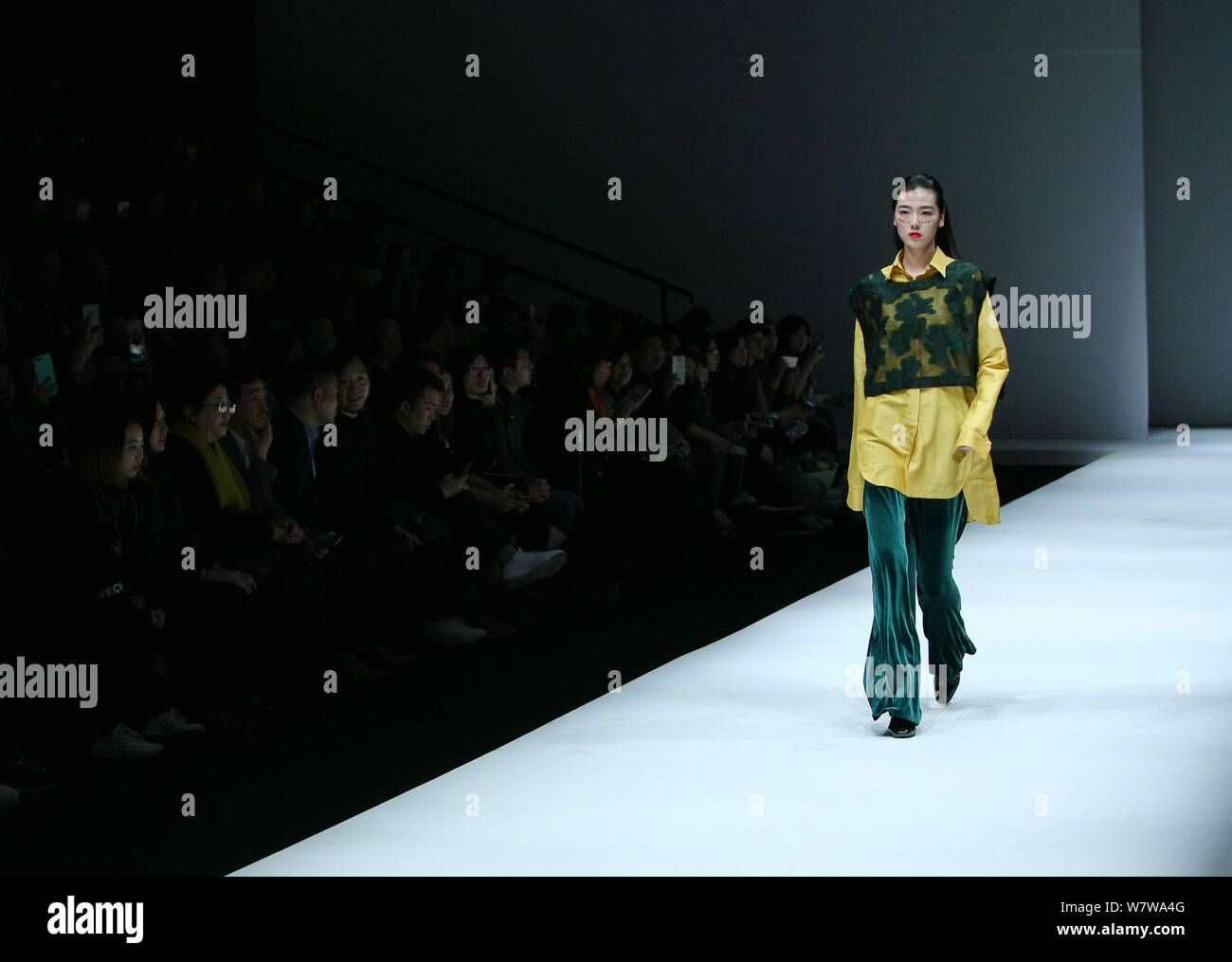 A model displays a new creation at the fashion show of Y'S mono by ...