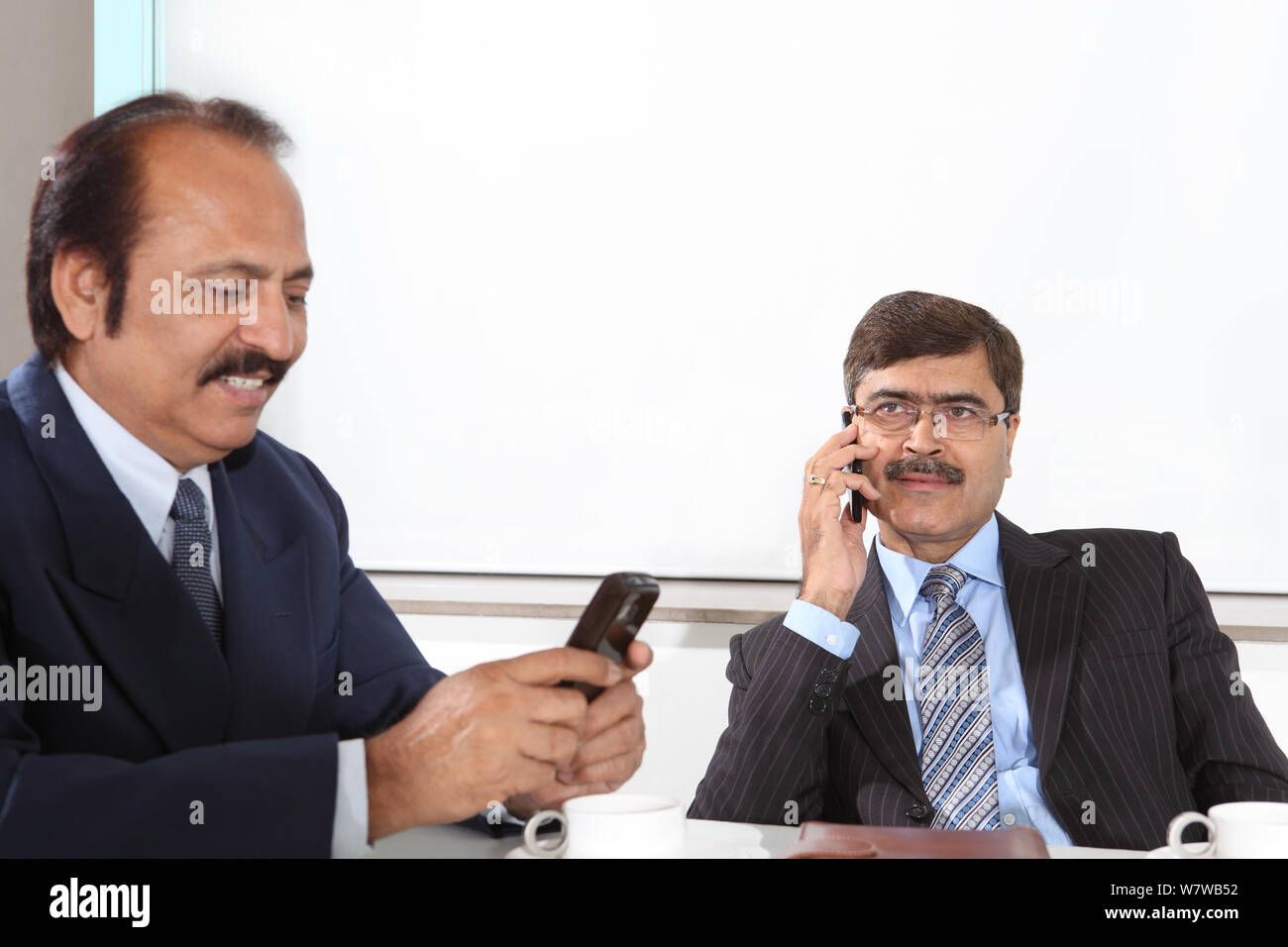 Indian man 50s business suit hi-res stock photography and images - Alamy