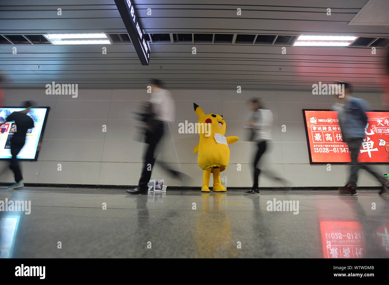 Chinese father Liu Yuehu, who is dressed up as Pikachu to raise money ...