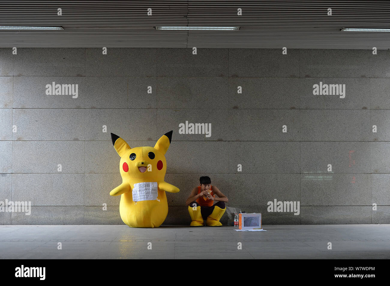 Chinese father Liu Yuehu, who is dressed up as Pikachu to raise money ...
